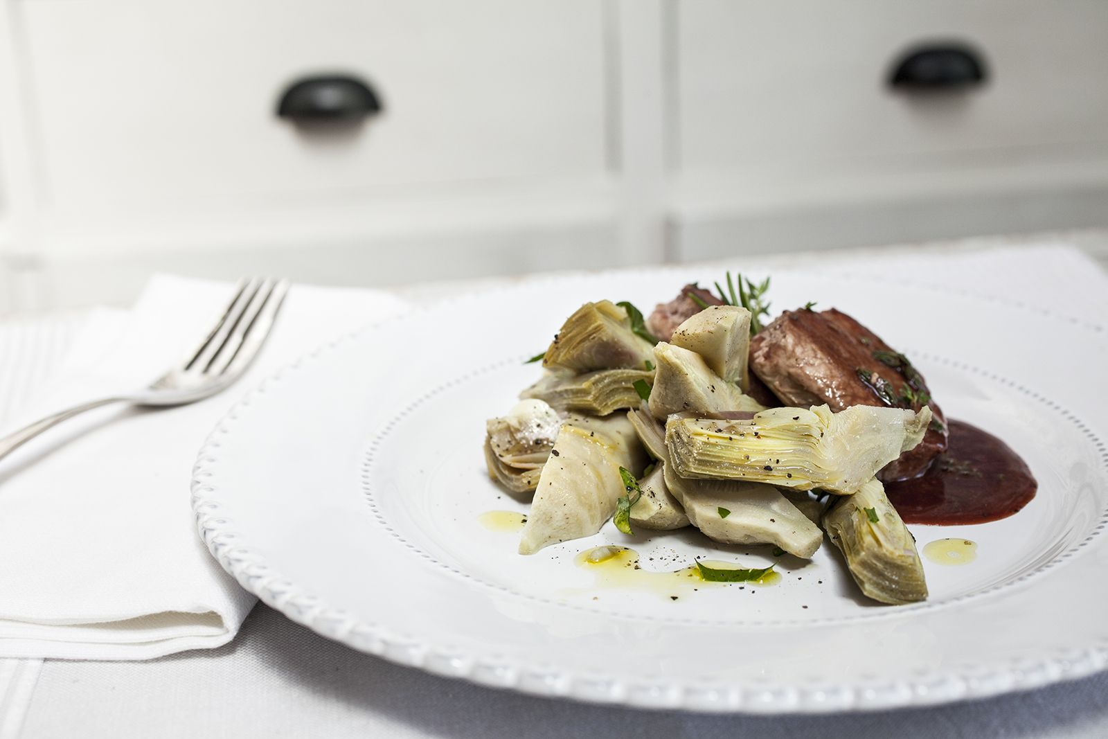 Carciofi con filetto di maiale al vino rosso - Ricette Orogel